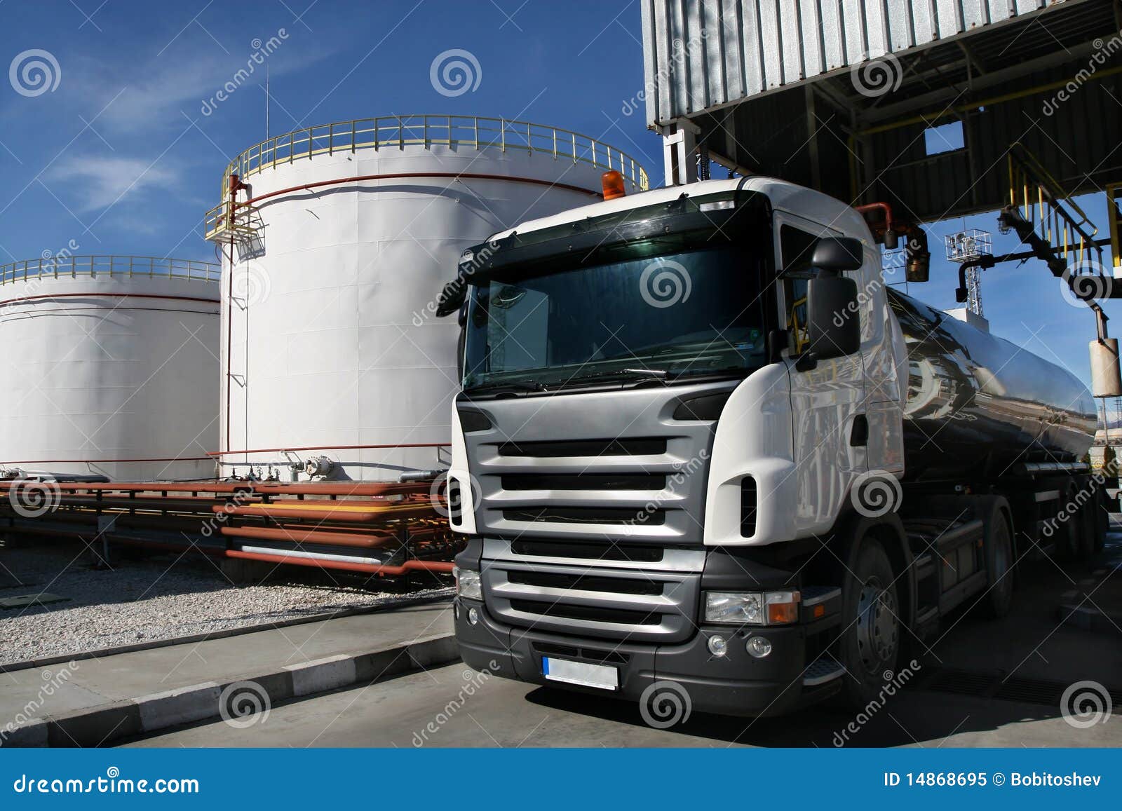 Trucks and refinery stock image. Image of tank, generation - 14868695
