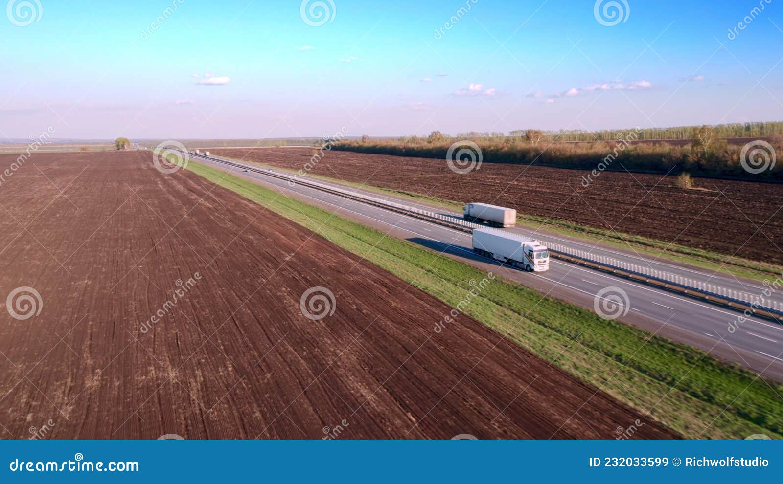 Trucks with a Trailers with Things and Goods Go on the Highway. the ...