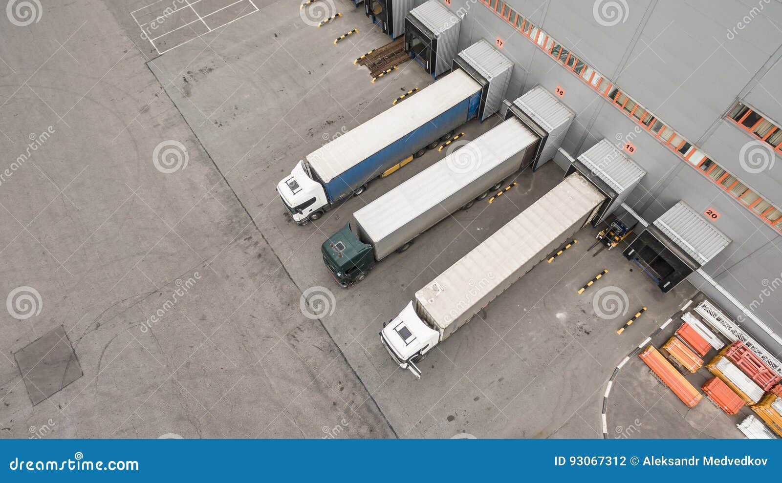 Trucks Unloading in Logostics Center Stock Photo - Image of entrance ...