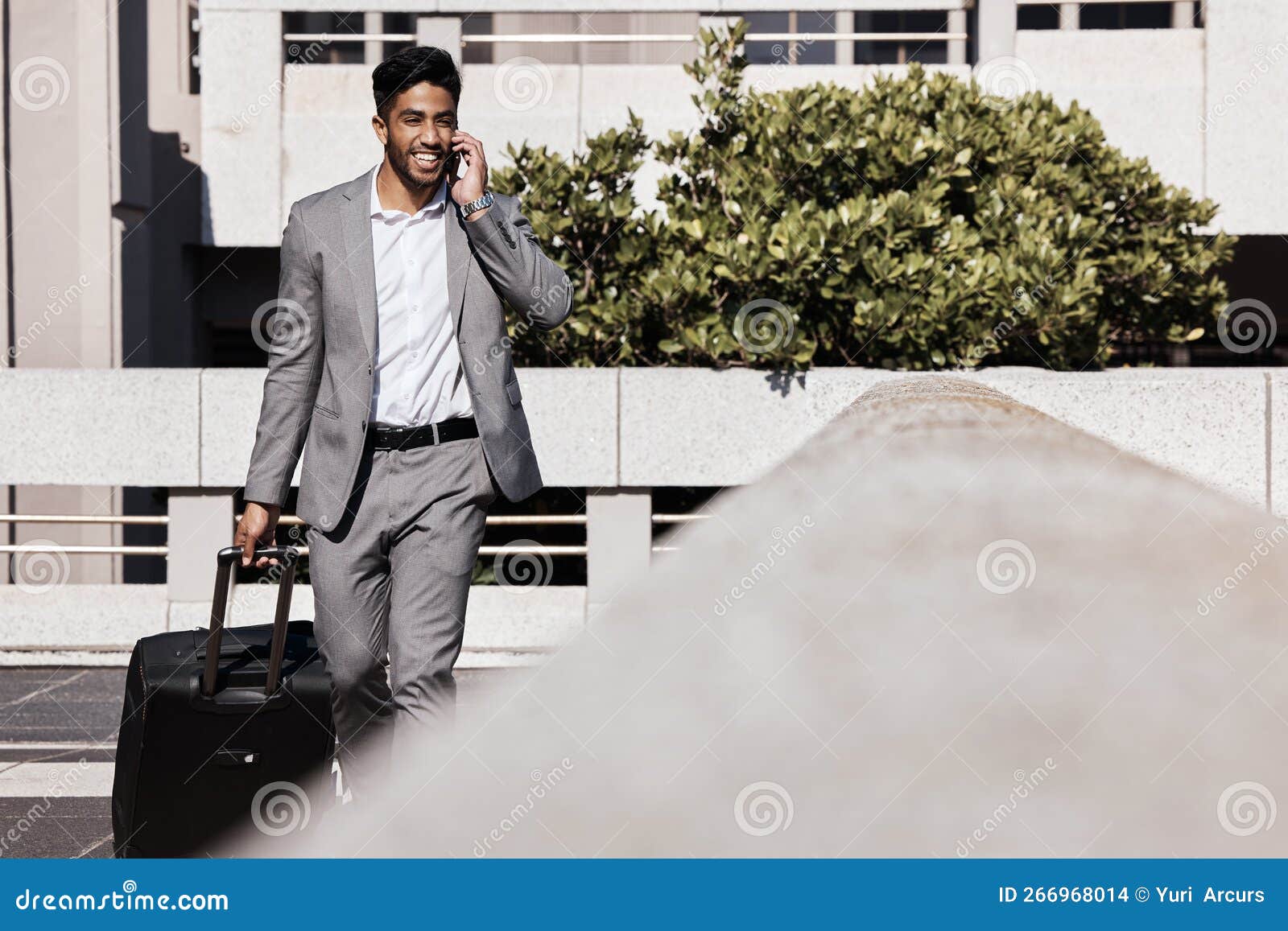 A True Businessman. a Young Businessman on a Call in the City. Stock ...