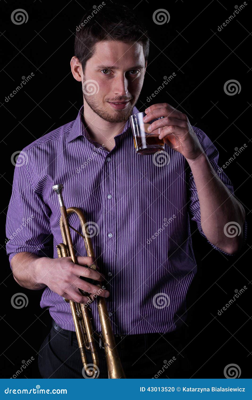 Trumpet Player Having a Break Stock Photo - Image of break, practice ...