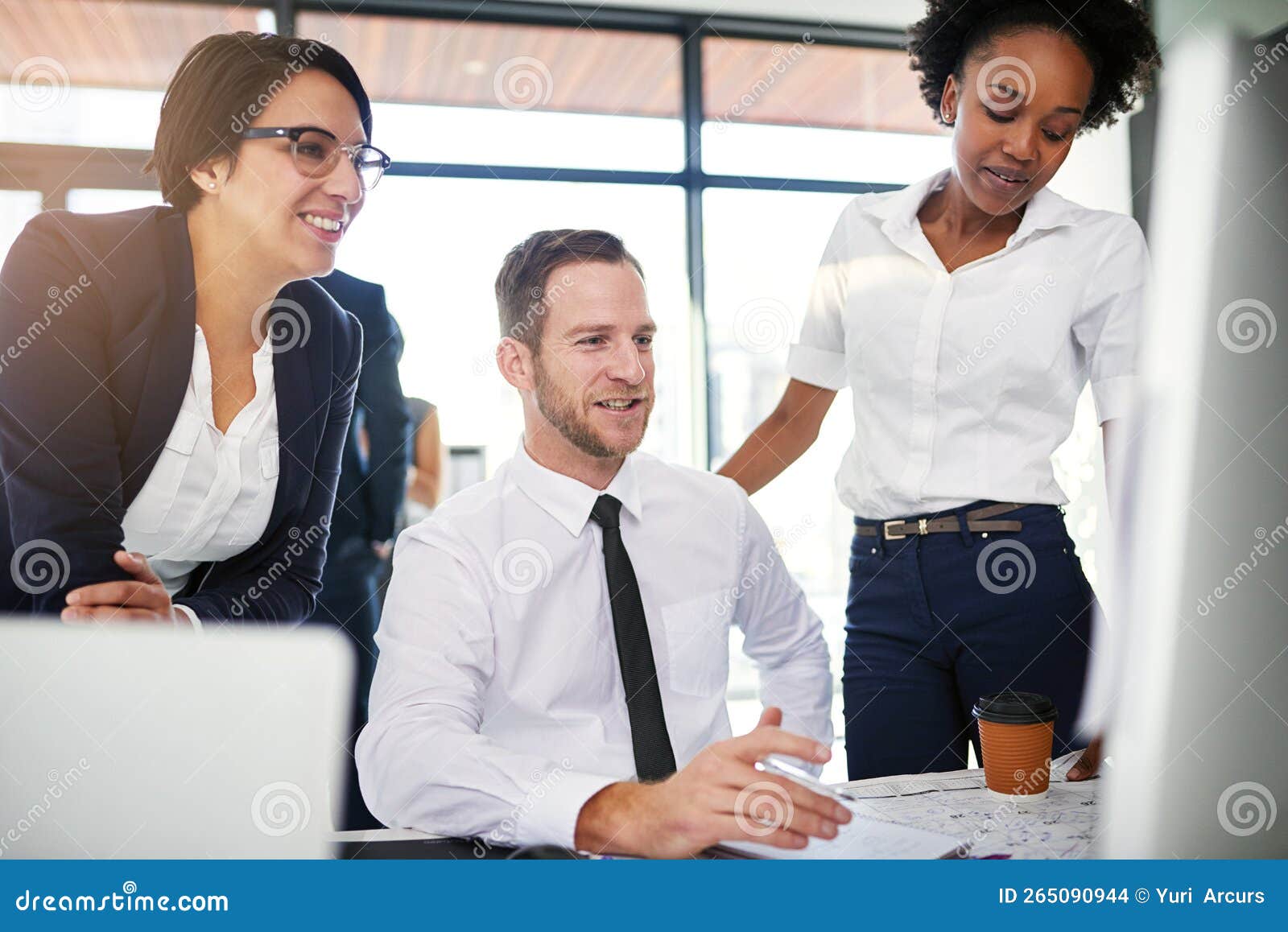 Trust and Teamwork. a Group of Businesspeople Gathered Around a ...