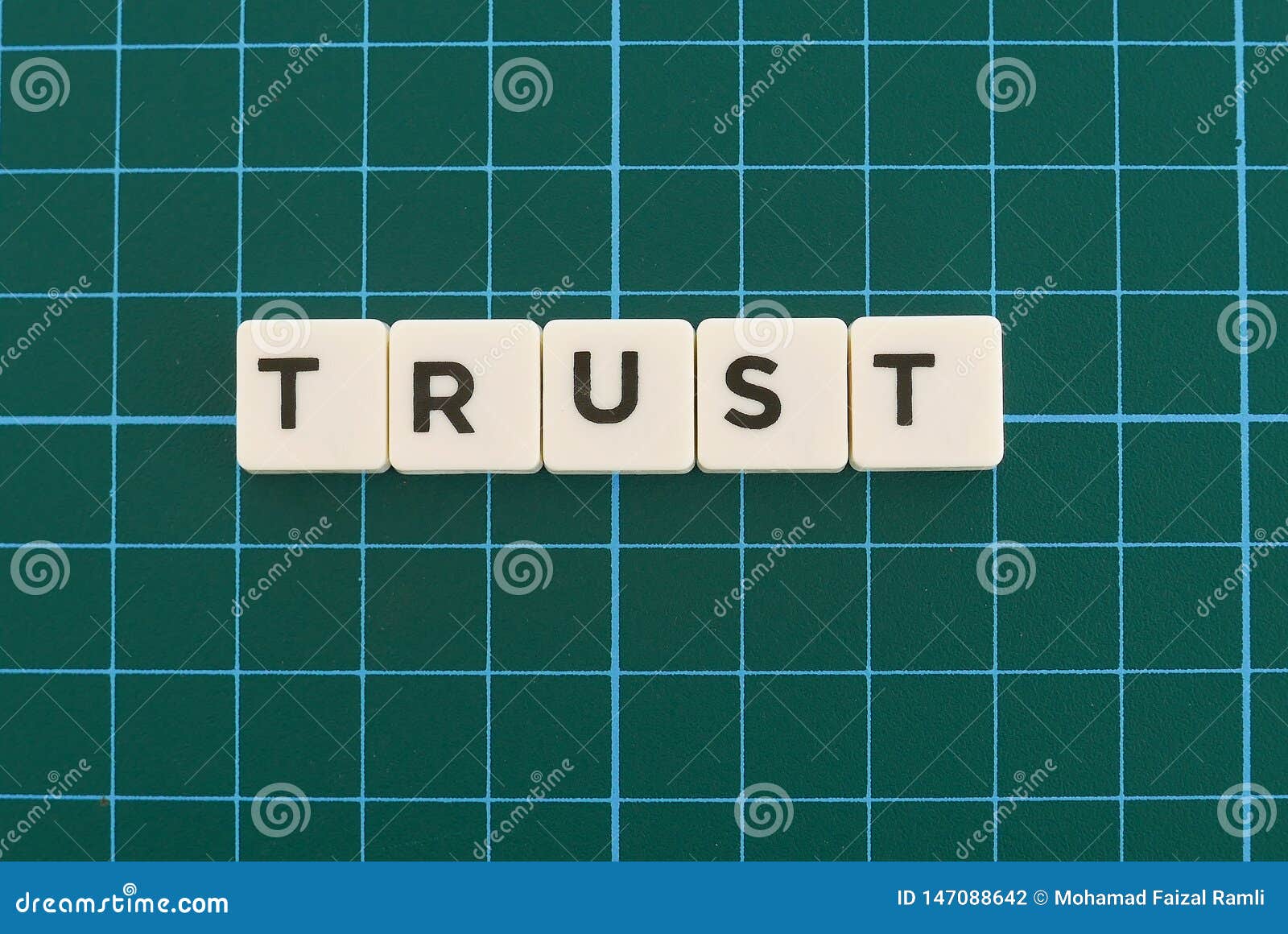 Trust Word Made of Square Letter Word on Green Square Mat Background ...