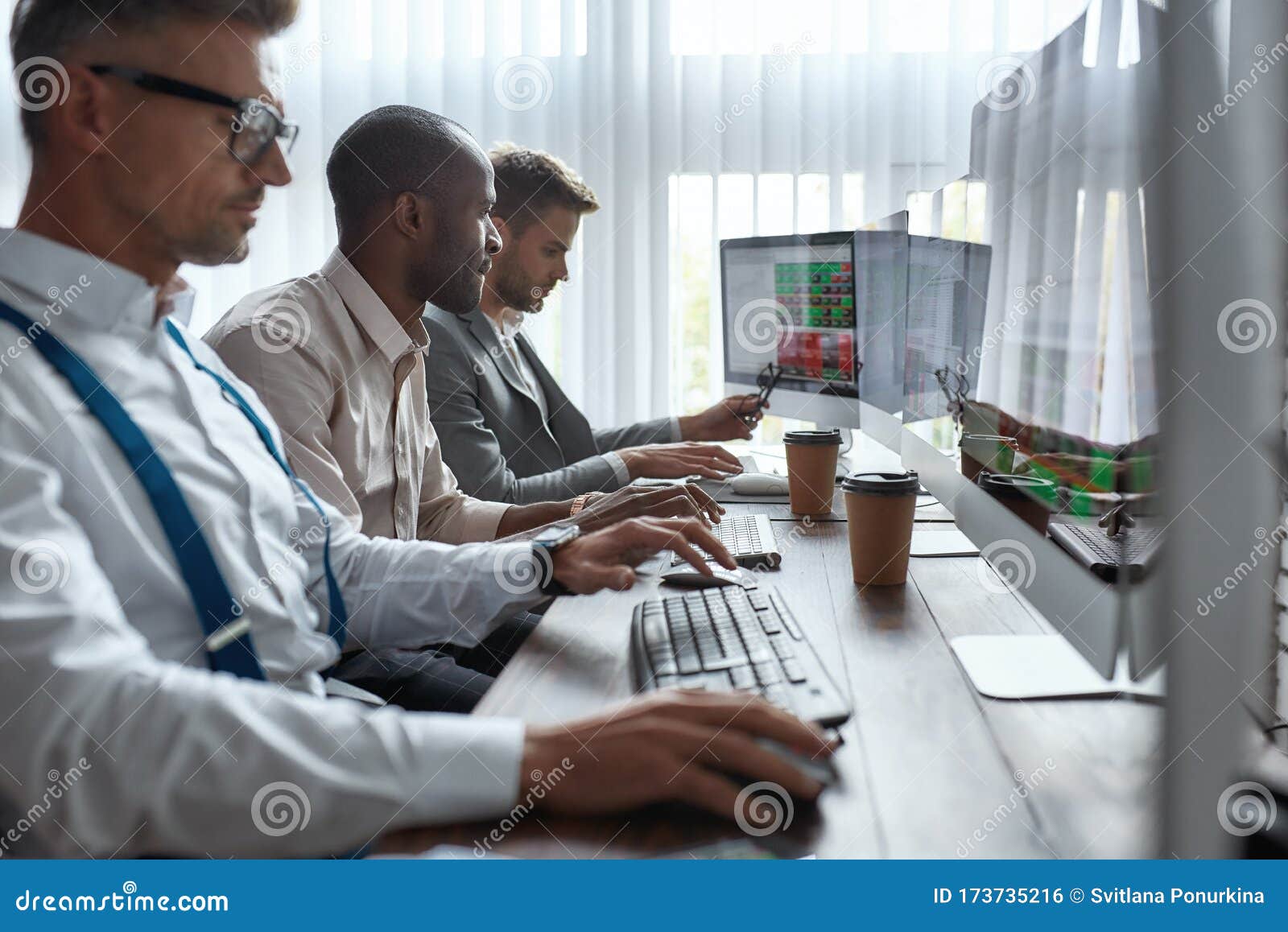 Try and Try, Earn and Learn. Three Businessmen Sitting at Desktop Front ...