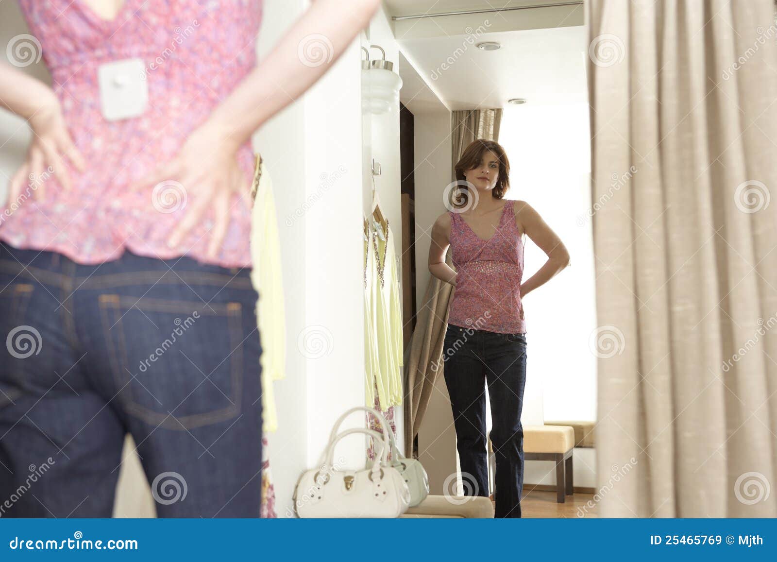 Trying Clothes on stock image. Image of confidence, consumerism - 25465769