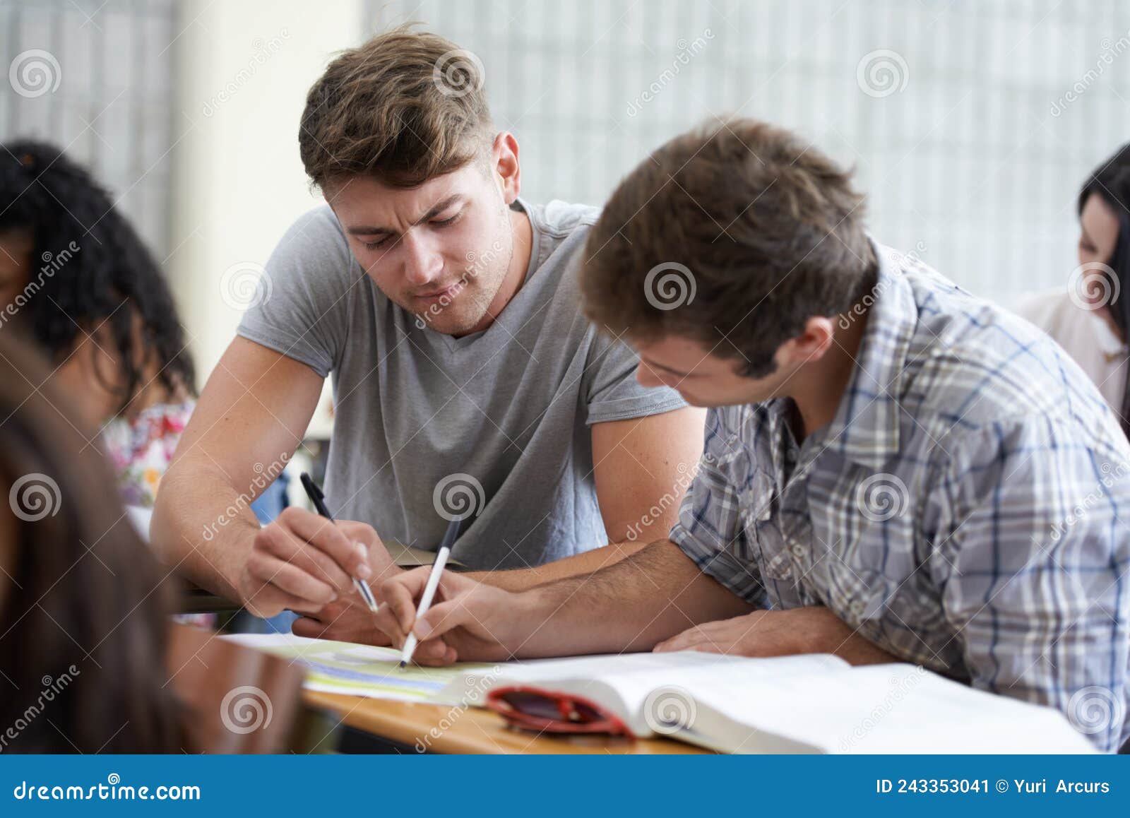 Trying To Get the Highest Grade. Shot of Young College Student Studying ...