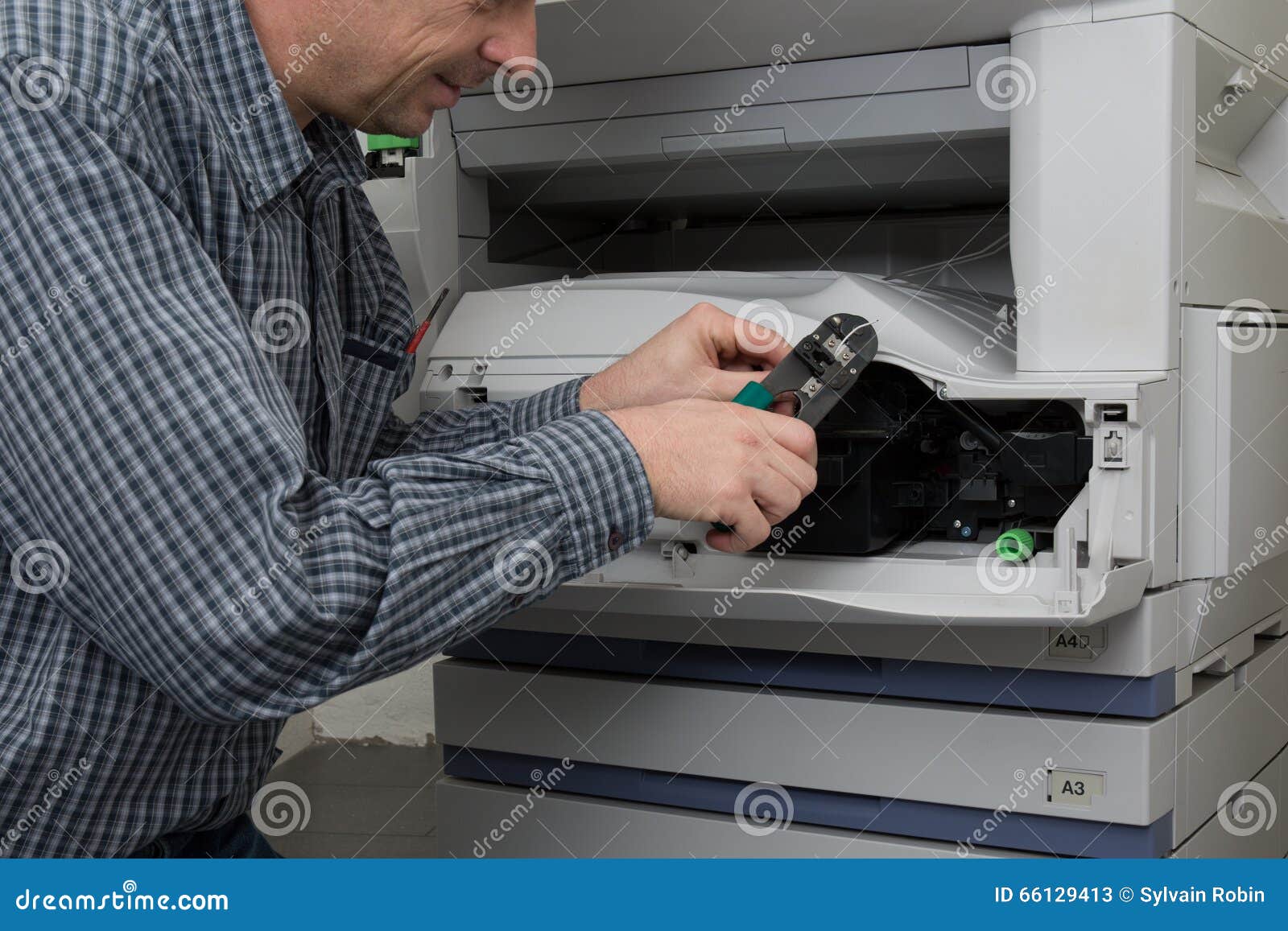 Trying To Repair the Office Printer at Work Stock Image - Image of ...