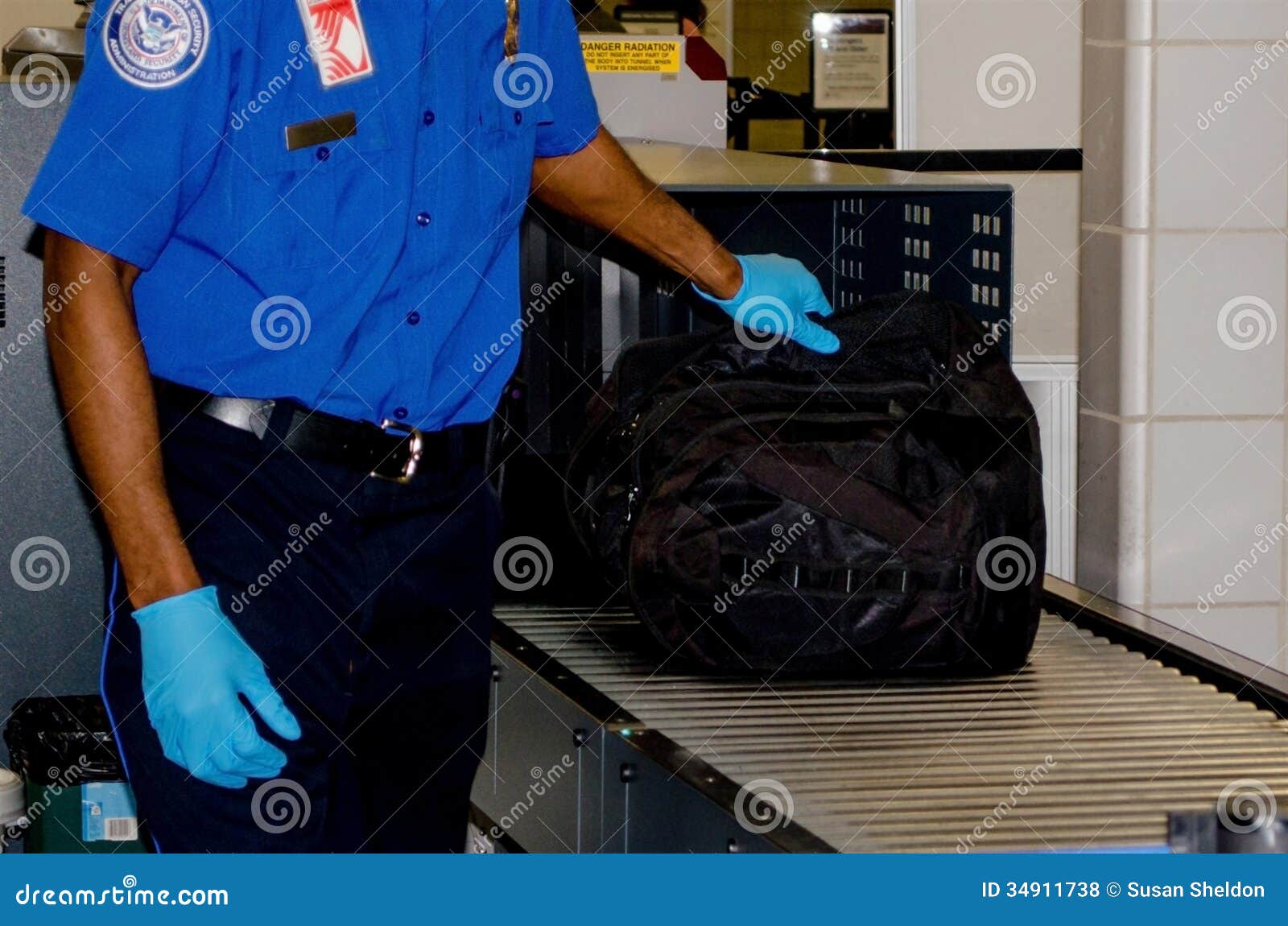 TSA handling a bag editorial stock photo. Image of worker - 34911738