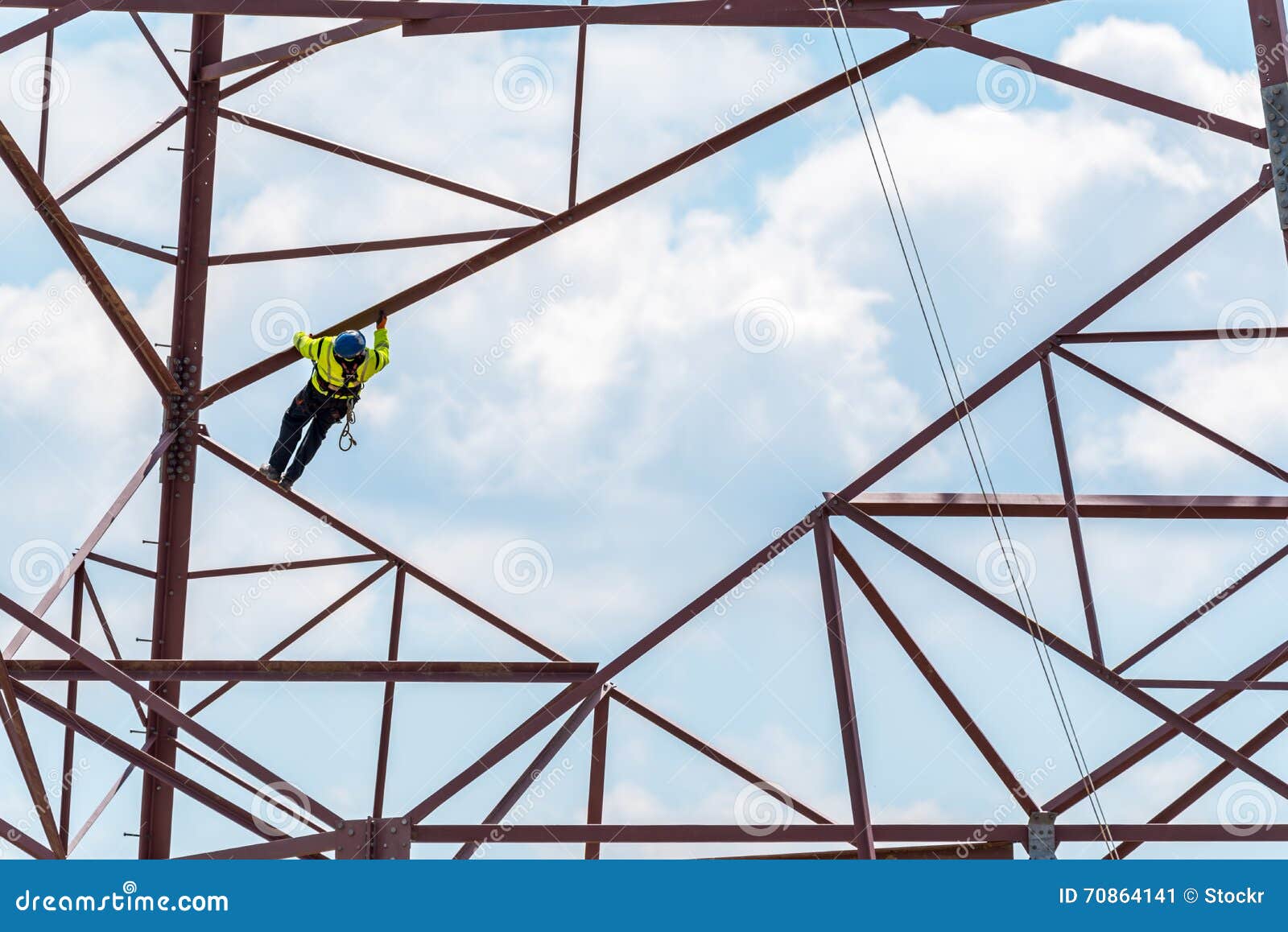 Tthe Worker Climbing on the High Dangerous Powerlines Stock Image ...