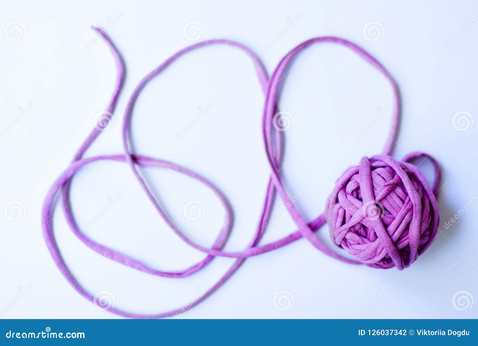 Tub of pink knitted thread stock photo. Image of handwork - 126037342