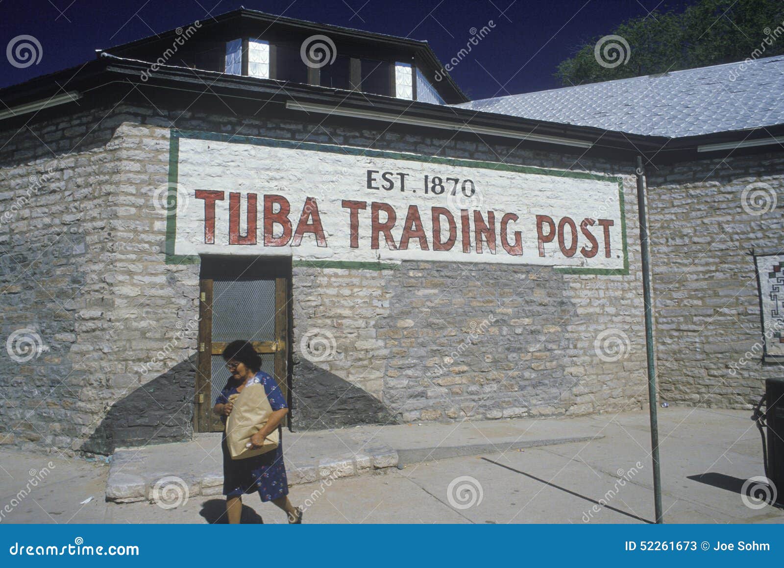 Tuba Trading Post Sign Painted on Adobe Brick Wall of Building ...