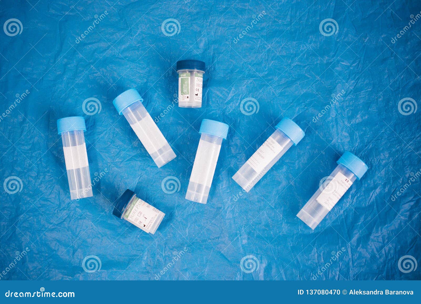 Tube for Sampling Biological Material on a Blue Background, Top View ...