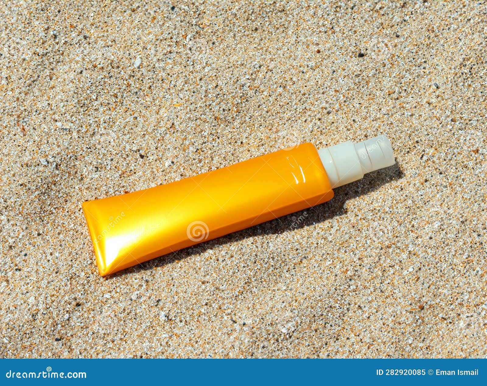 Tube of Sunscreen on Beach Sand Stock Image - Image of skin, lighting ...