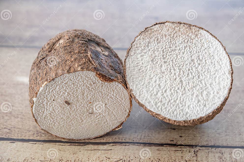 A Tuber of Yam Cut in Two Ready for Cooking Stock Photo - Image of ...