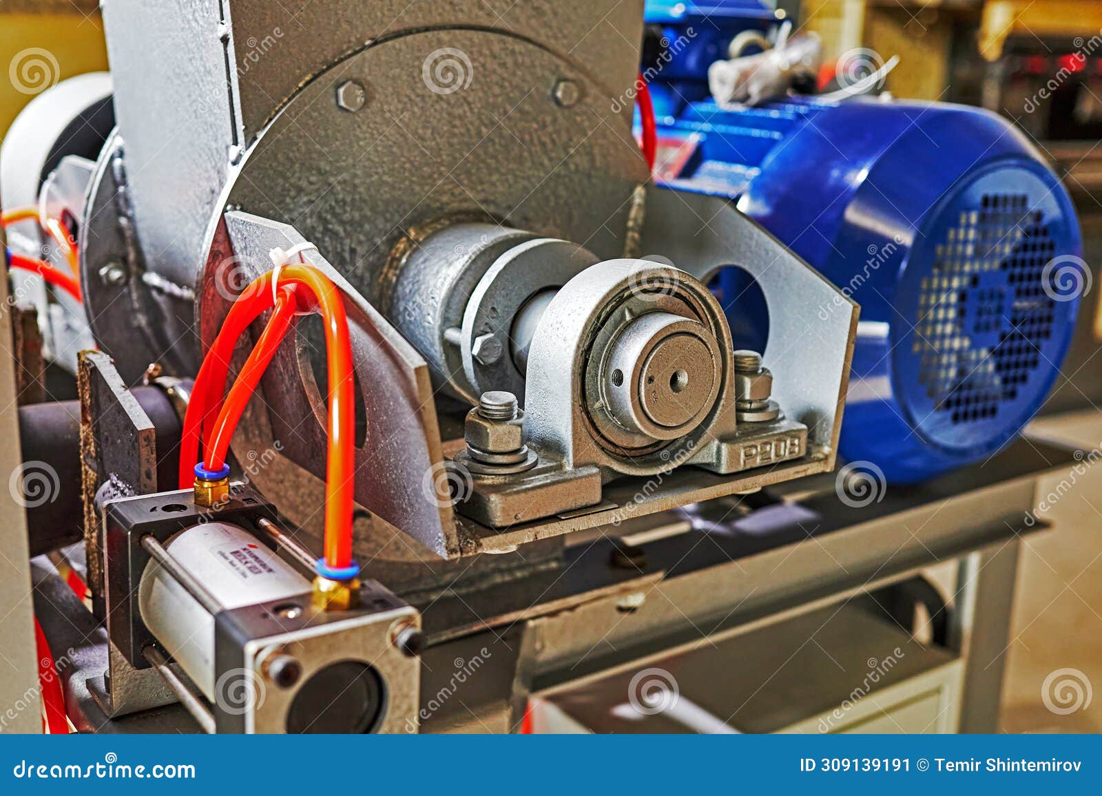 Tubes of the Pneumatic System and Shaft of Machine with Electric Motor ...
