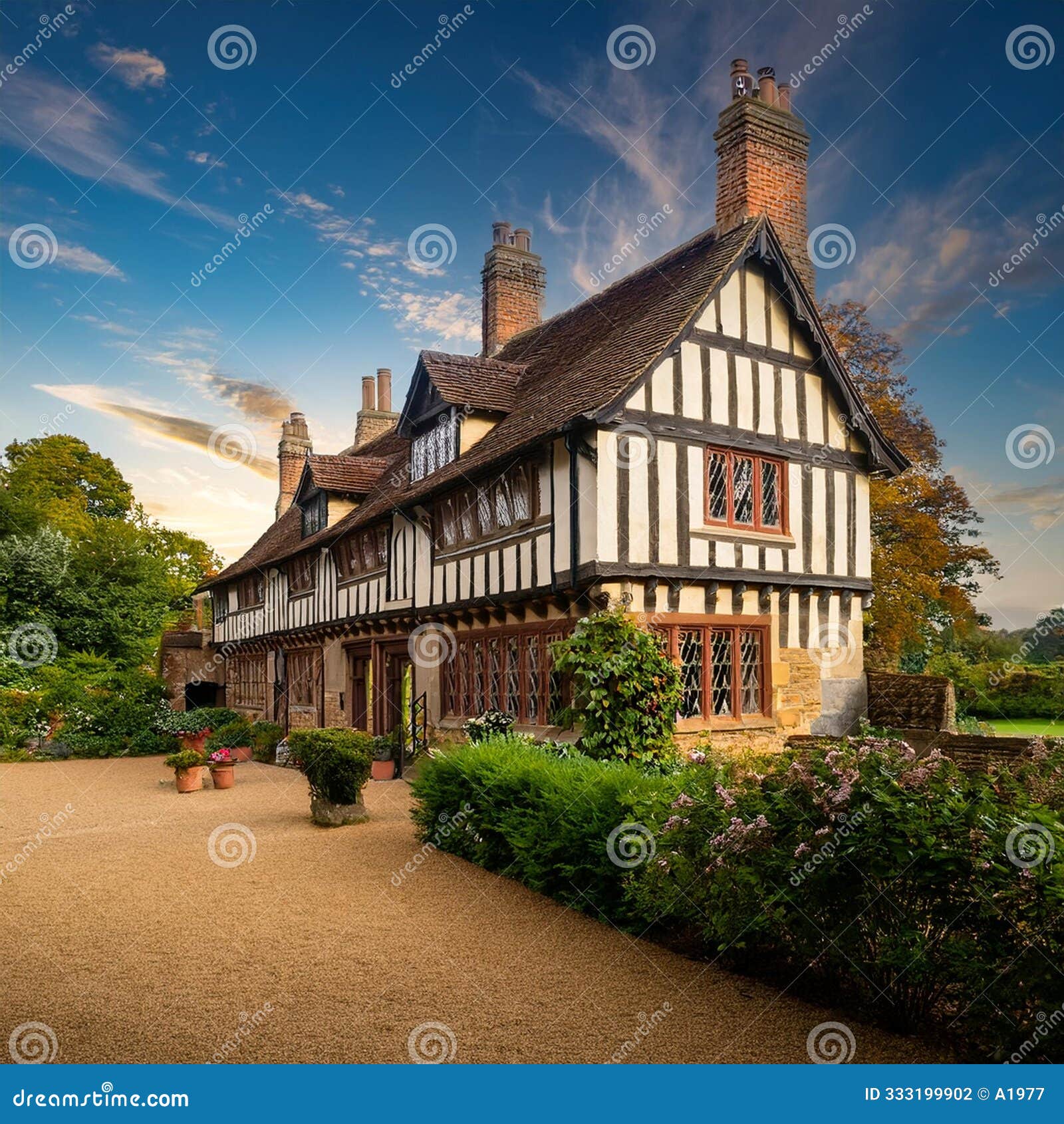 Tudor House Surrounded By Lush Greenery, With A Glimpse Of The Lake In ...