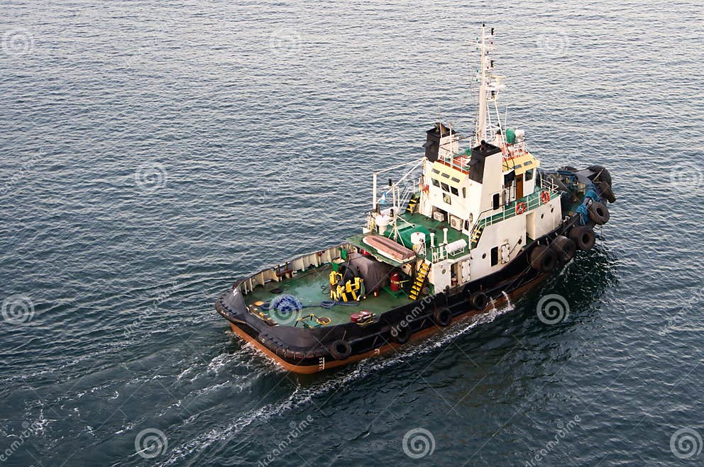 Tug Boat Helping Ships in the Harbor Stock Photo - Image of harbour ...