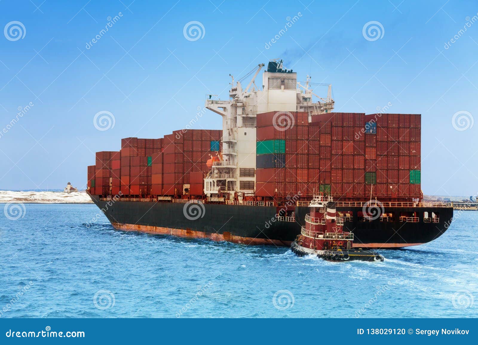 Tug Boat and Import Export Dry Cargo Ship Stock Photo - Image of ...