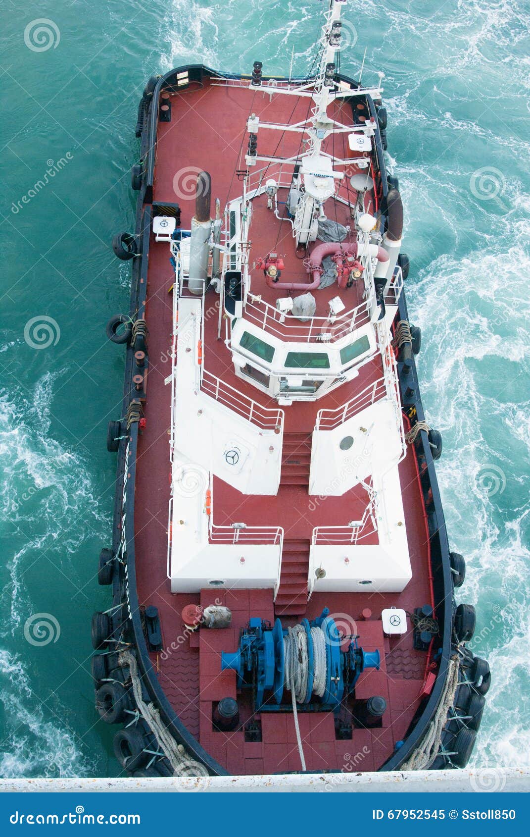 Tug boat moving ship stock image. Image of port, ocean - 67952545