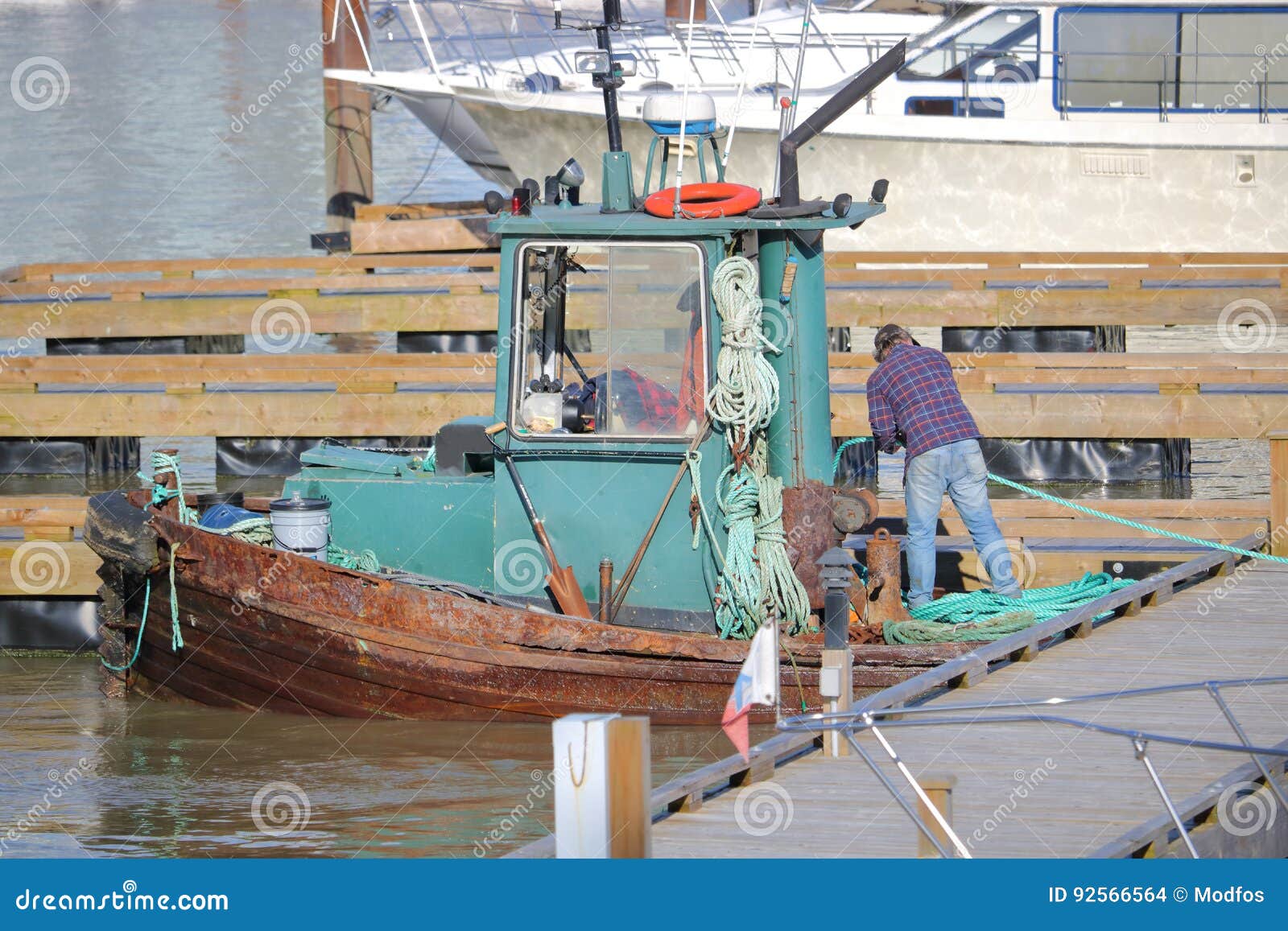 Tug Boat Operator and Boat stock photo. Image of green - 92566564