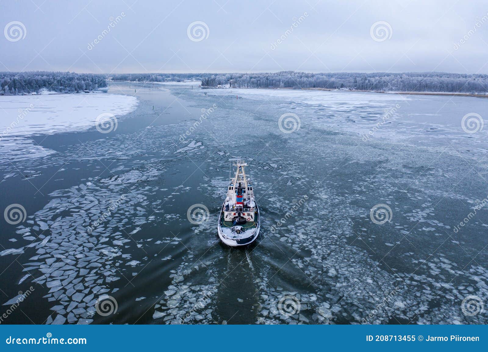 Tug Boat Pushing Through The Ice On A Sea In Winter Royalty-Free Stock ...