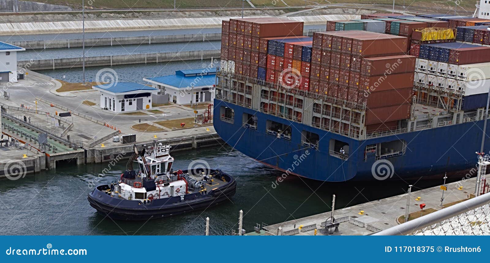 Container Ship with Tug Boat Stock Image - Image of level, locks: 117018375