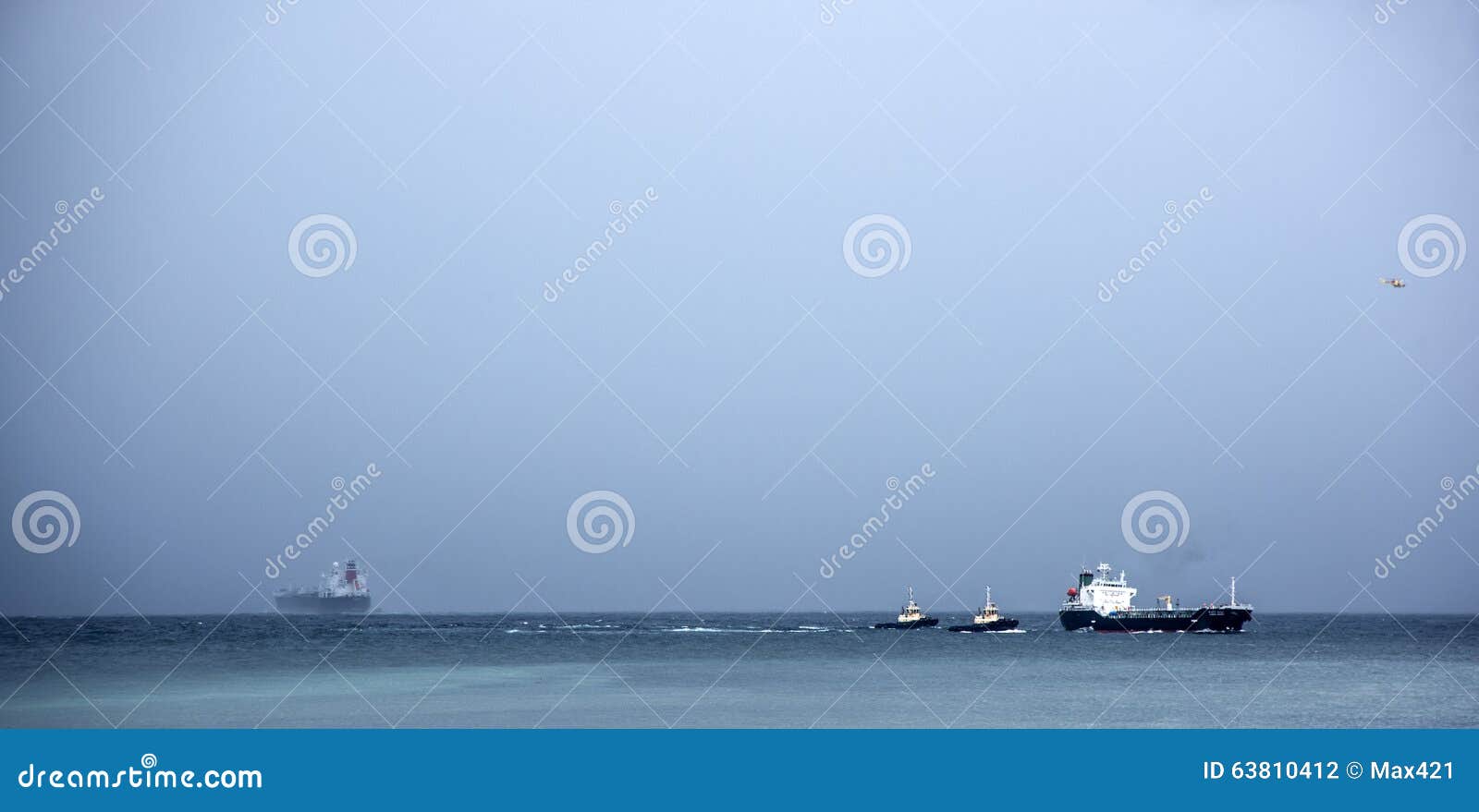 Tug Boats and Cargo Ships Near Botany Bay Stock Photo - Image of rocks ...