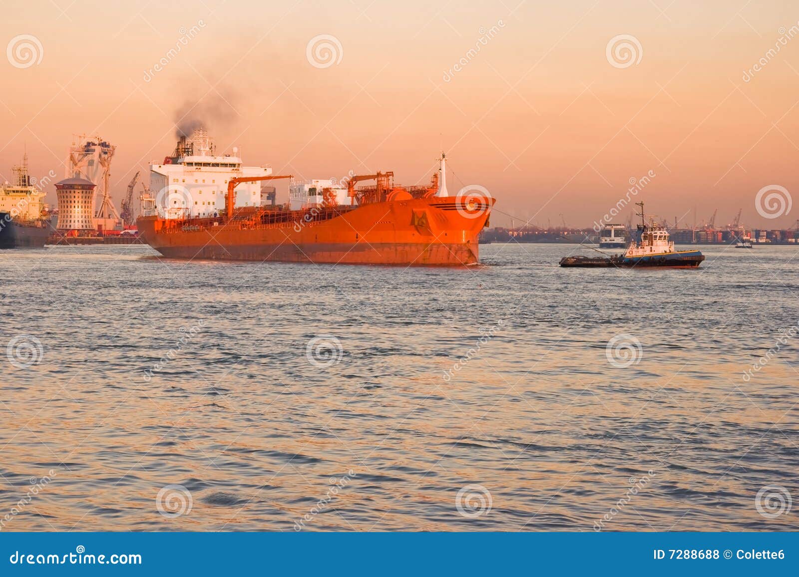 Tug and tanker sailing out stock photo. Image of vessel - 7288688