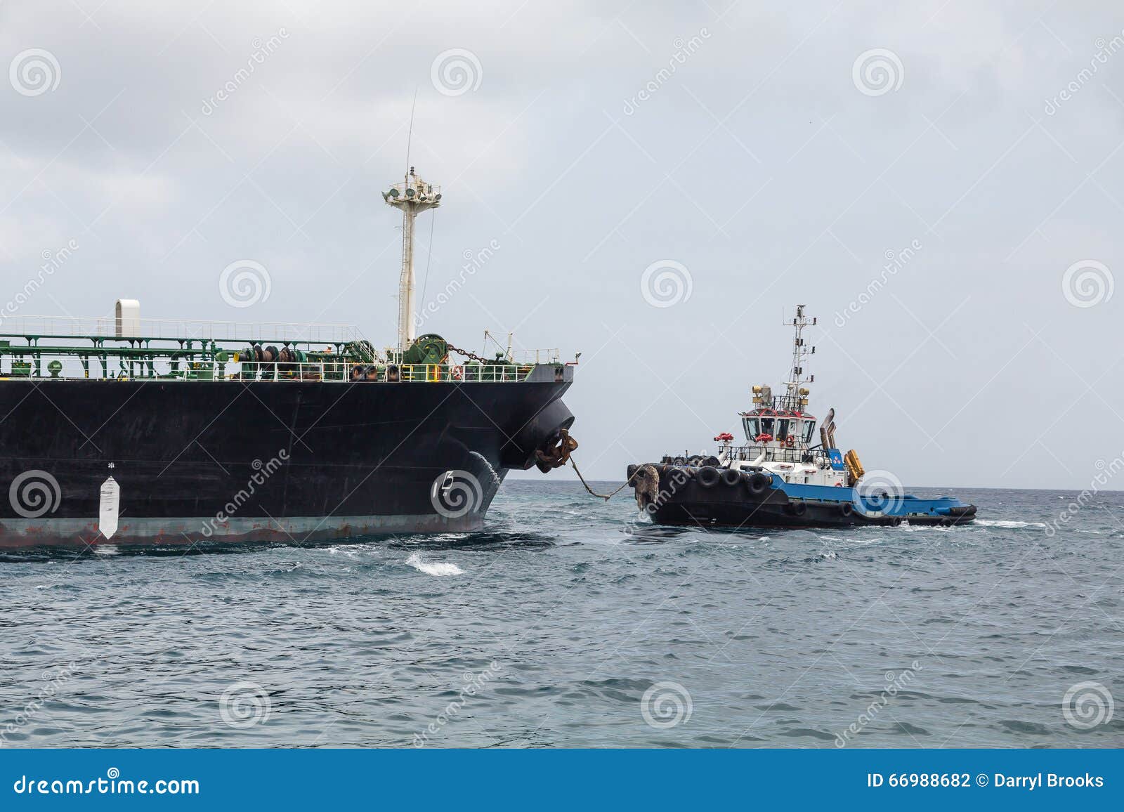 Tug Towing Tanker stock photo. Image of nautical, blue - 66988682