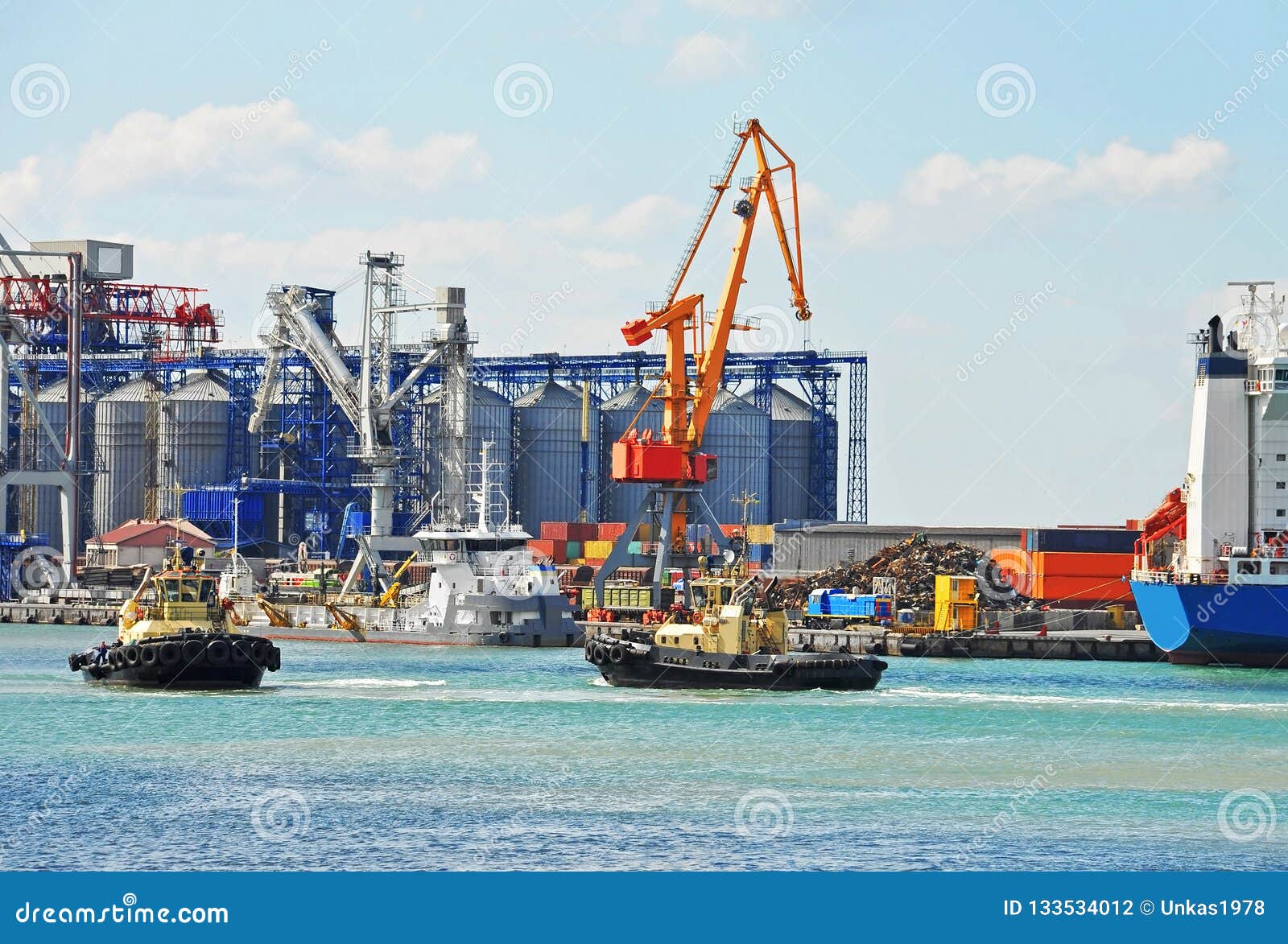 Tugboat Assisting Container Cargo Ship Stock Photo - Image of ...