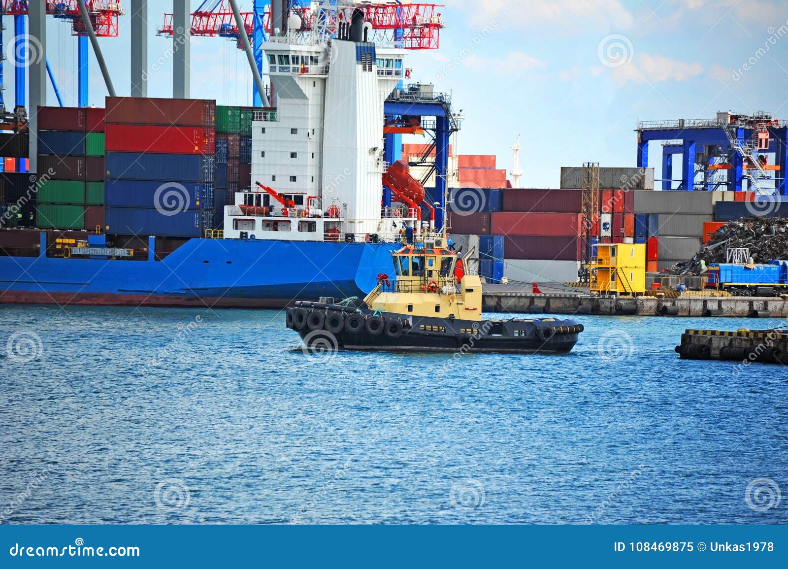 Tugboat Assisting Container Cargo Ship Stock Image - Image of quayside ...