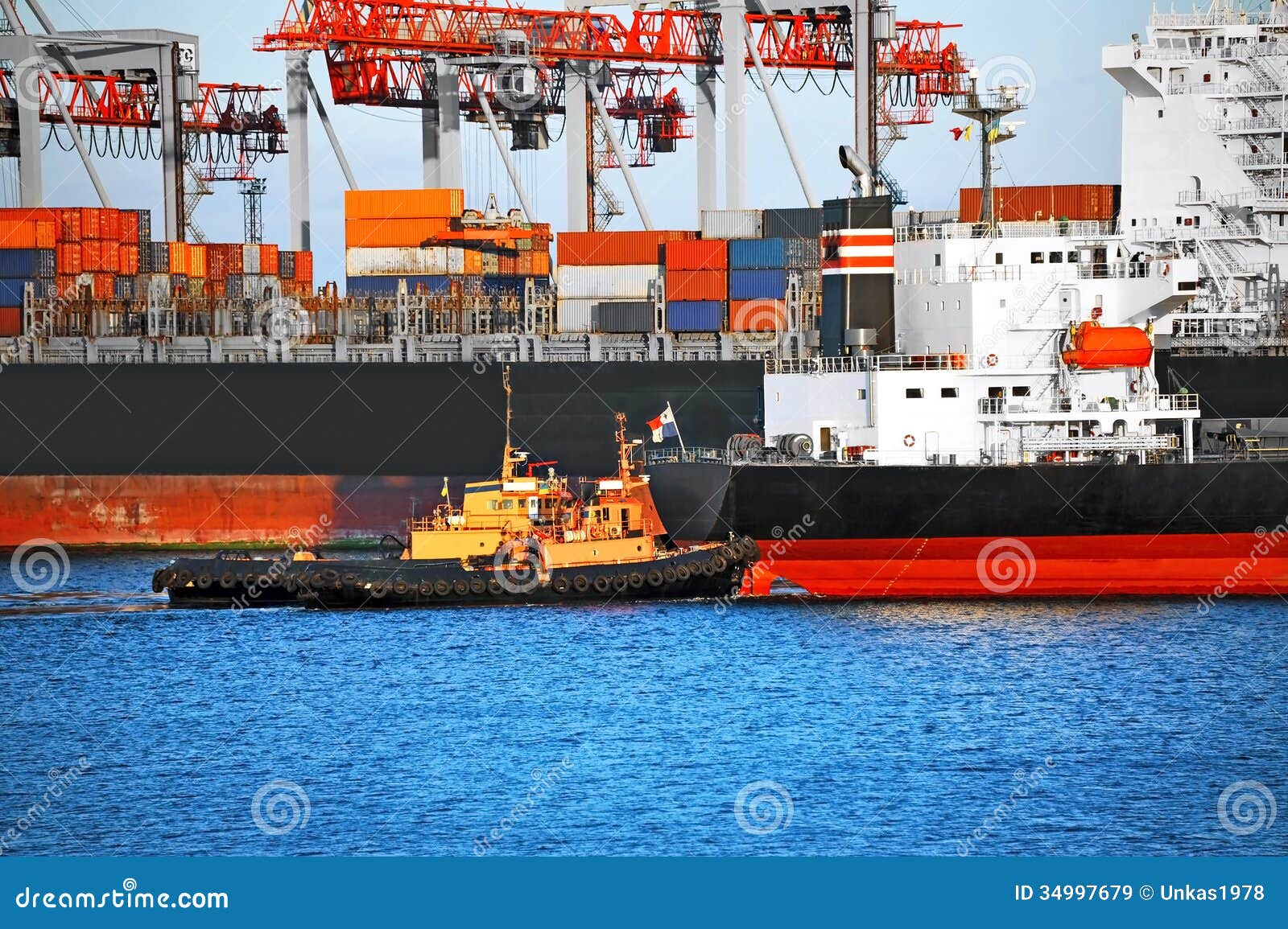 Tugboat Assisting Container Cargo Ship Stock Image - Image of industry ...