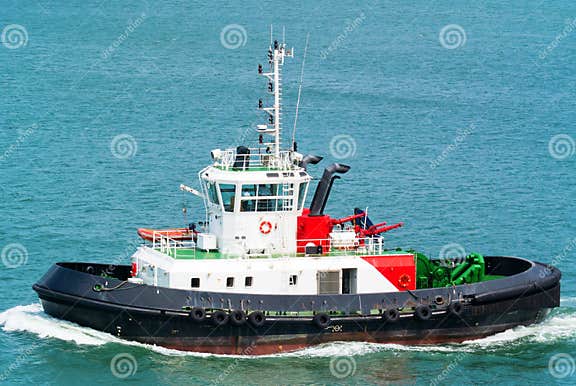 Tugboat in harbour stock image. Image of green, towage - 31614155