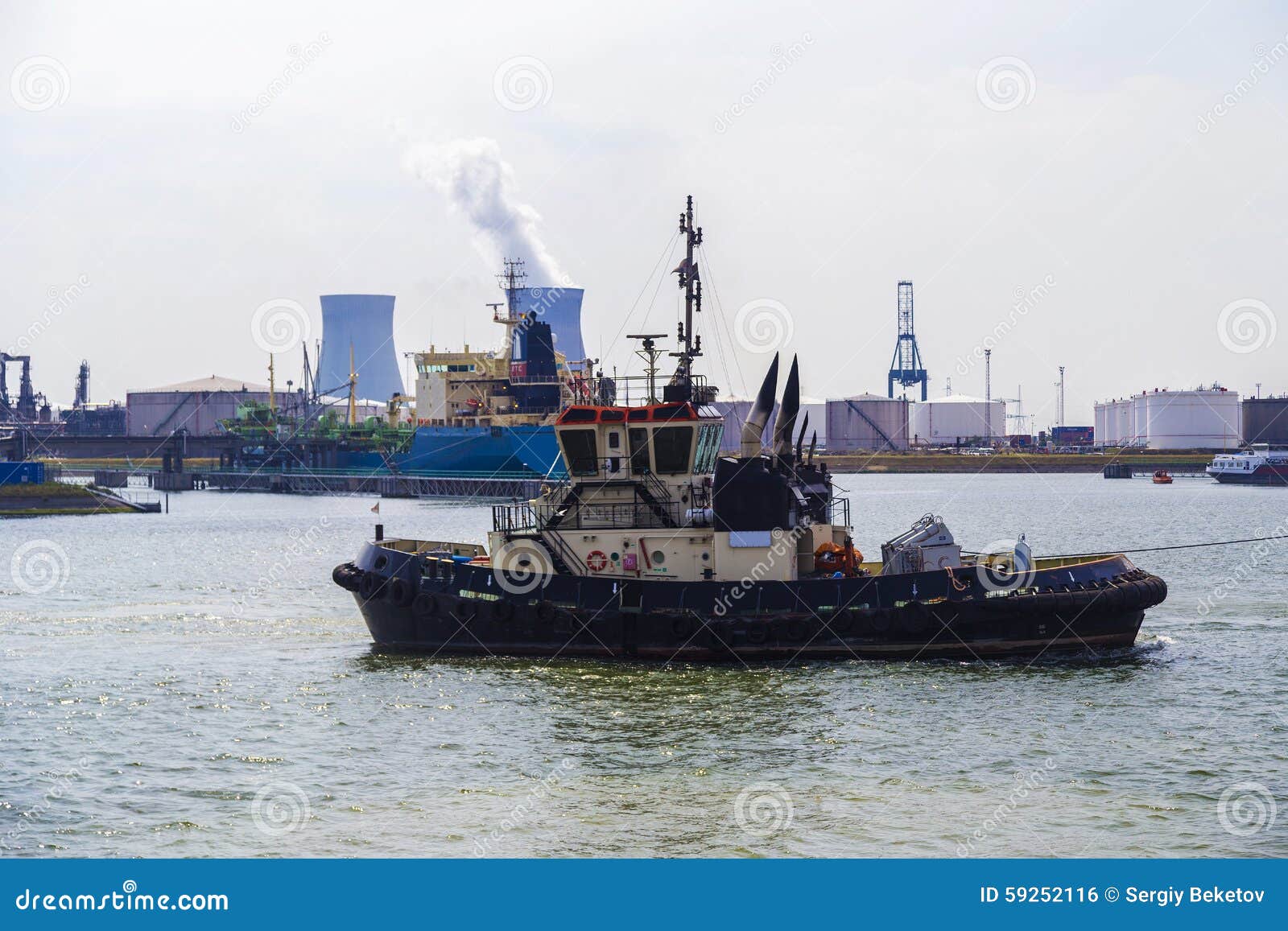 Tugboat in Port of Antwerp stock photo. Image of ship - 59252116