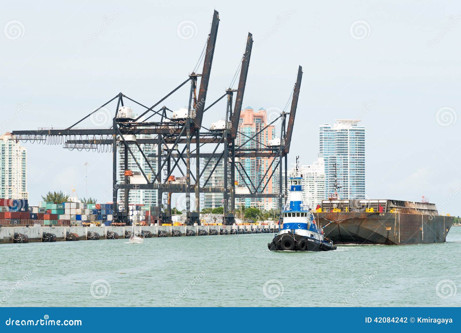 Tugboat Pulling a Barge in the Port of Miami Editorial Photography ...