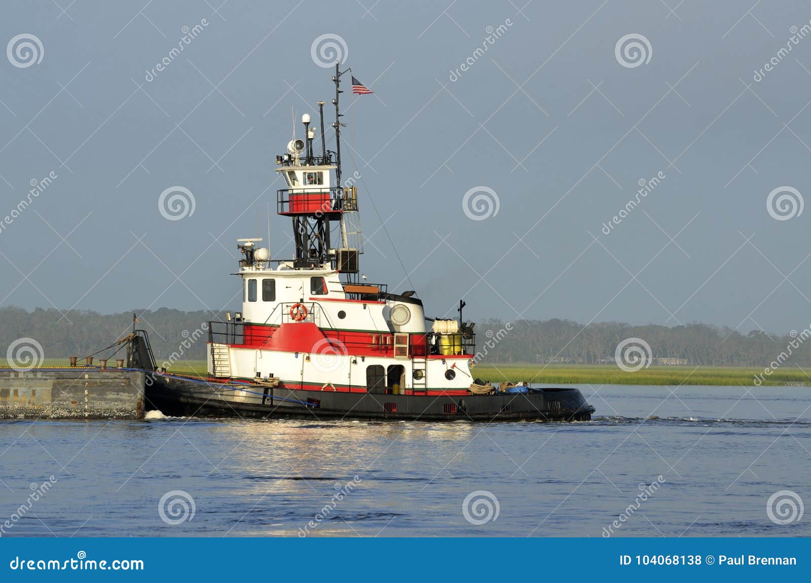Tugboat Pushing a Barge stock photo. Image of tugboat - 104068138