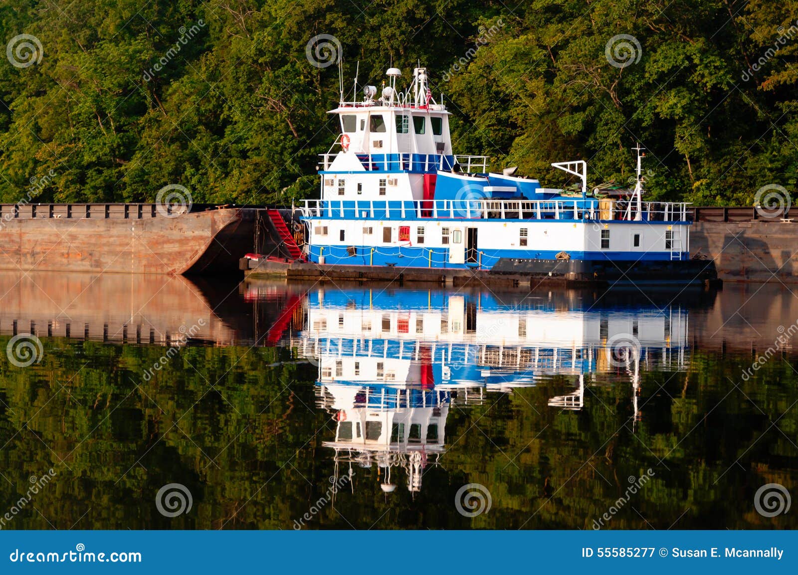 Tugboat on a River stock image. Image of river, barge - 55585277