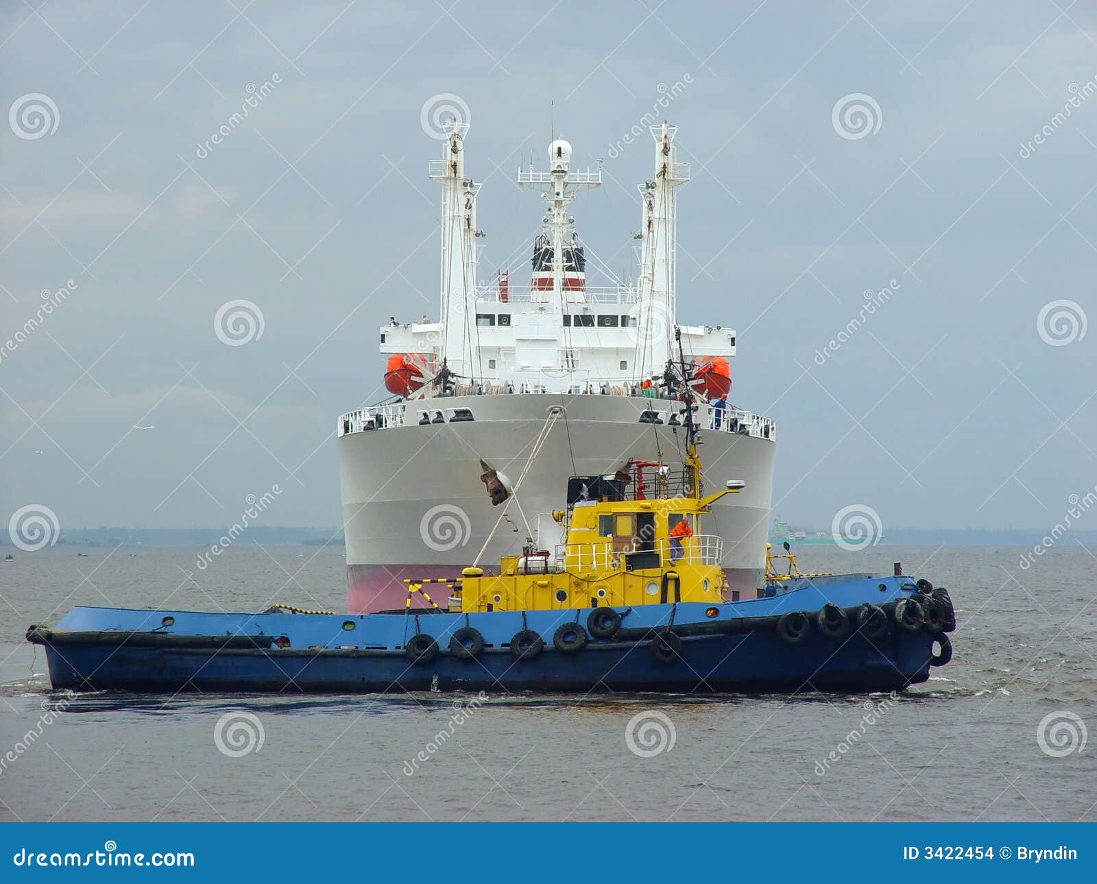 Tugboat Towing Full Loaded Cargo Ship From Port Royalty-Free Stock ... Tugboat Towing Full Loaded Cargo Ship From Port Royalty-Free Stock ...