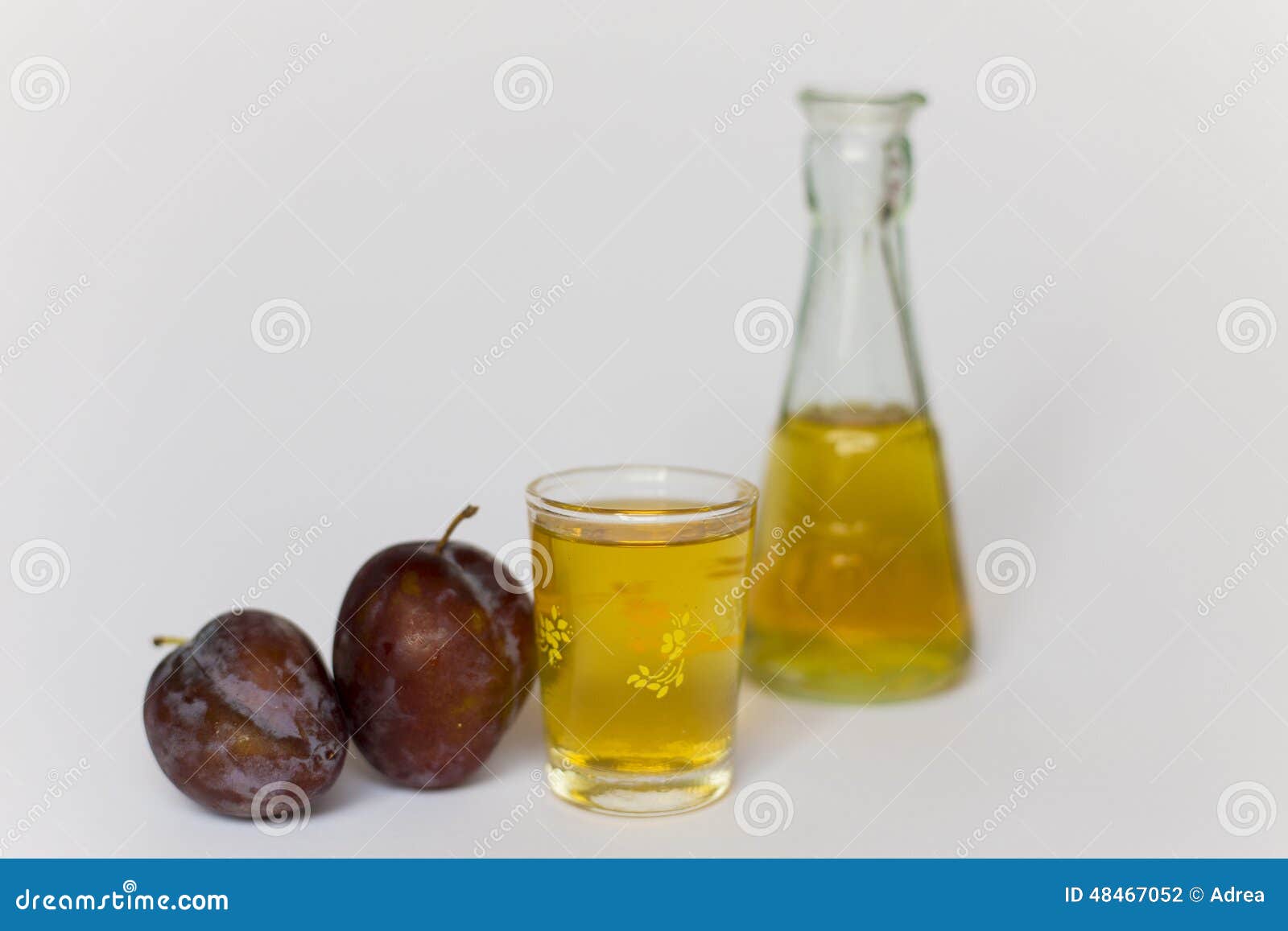 Plums, Small Glass with Tuica and a Small Bottle Stock Photo - Image of ...