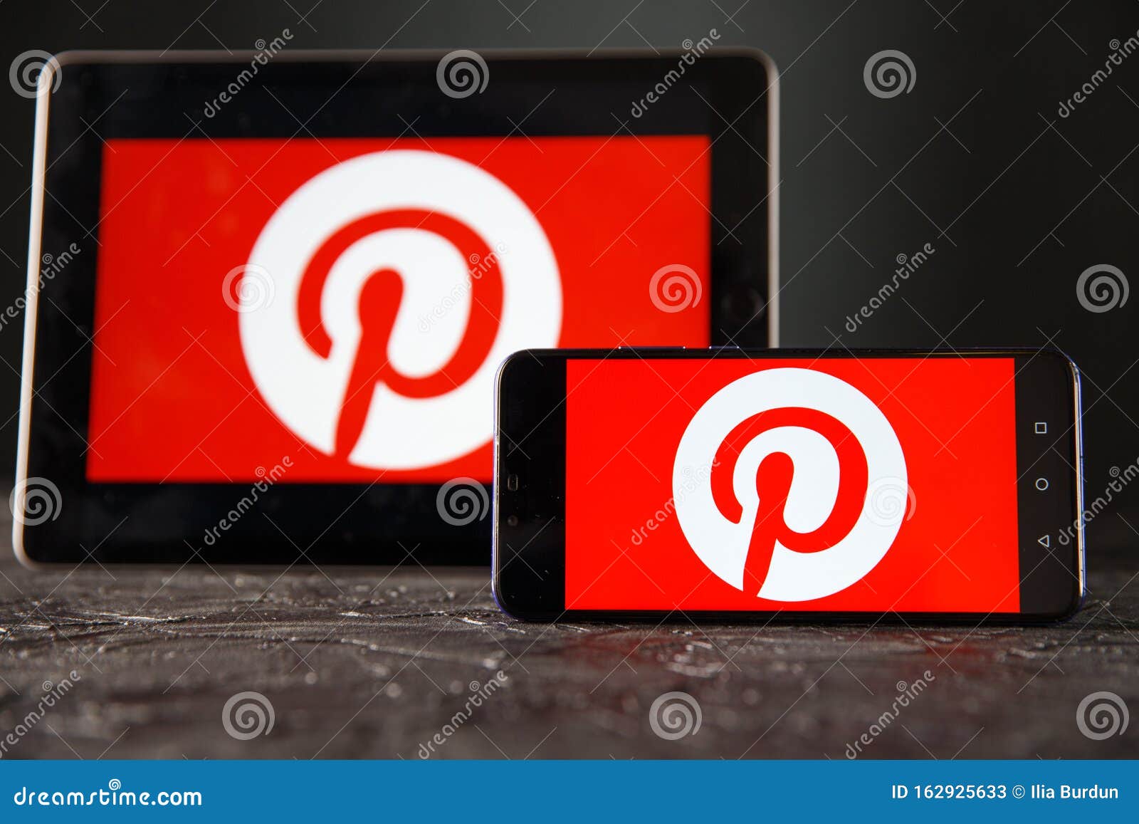 Tula 24 09 2019: Pinterest Logo on the Tablet and Phone Display ...