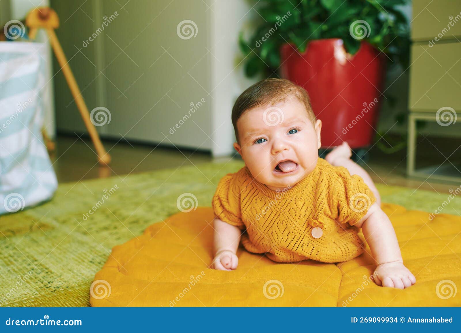 Tummy time for little baby stock photo. Image of face - 269099934