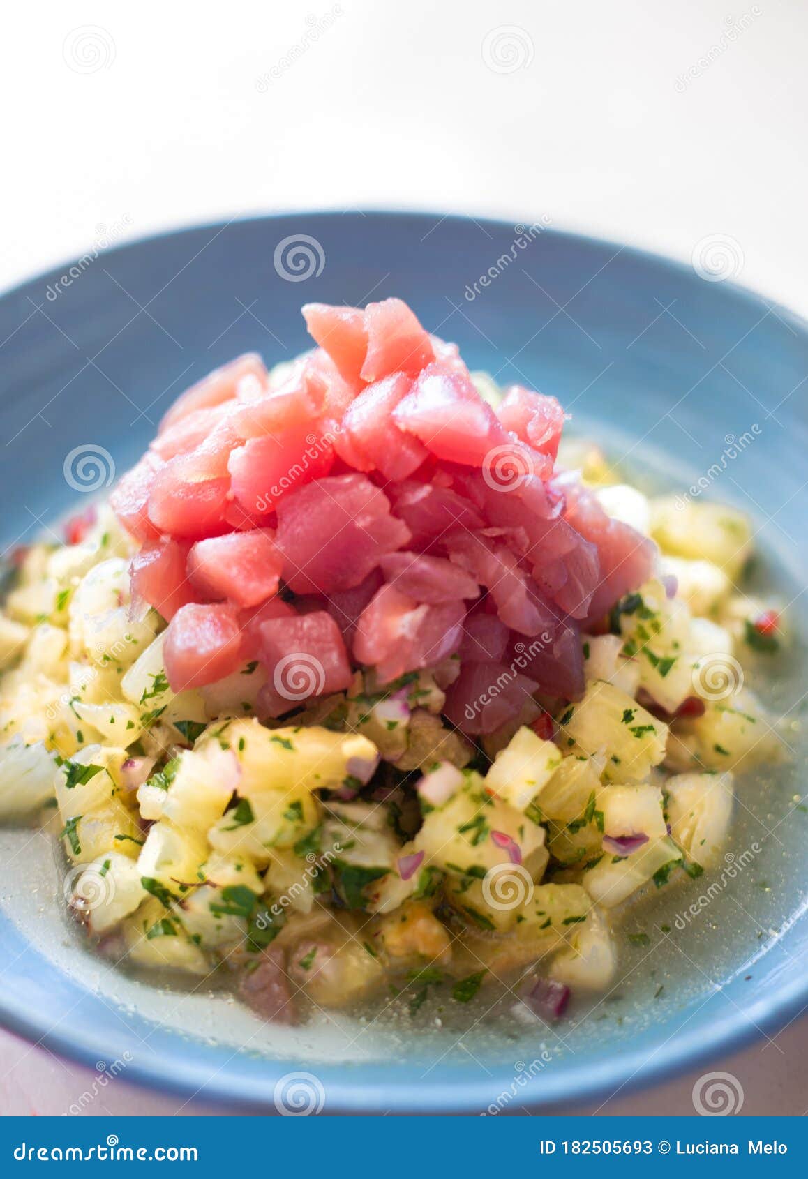 Tuna and Pineapple Brazilian Ceviche on a White Surface and Blue Dish ...