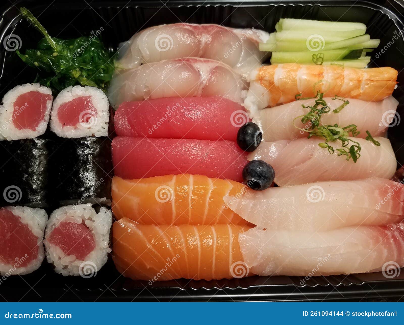 Tuna and Salmon Sushi with Blueberries in Container Stock Photo - Image ...