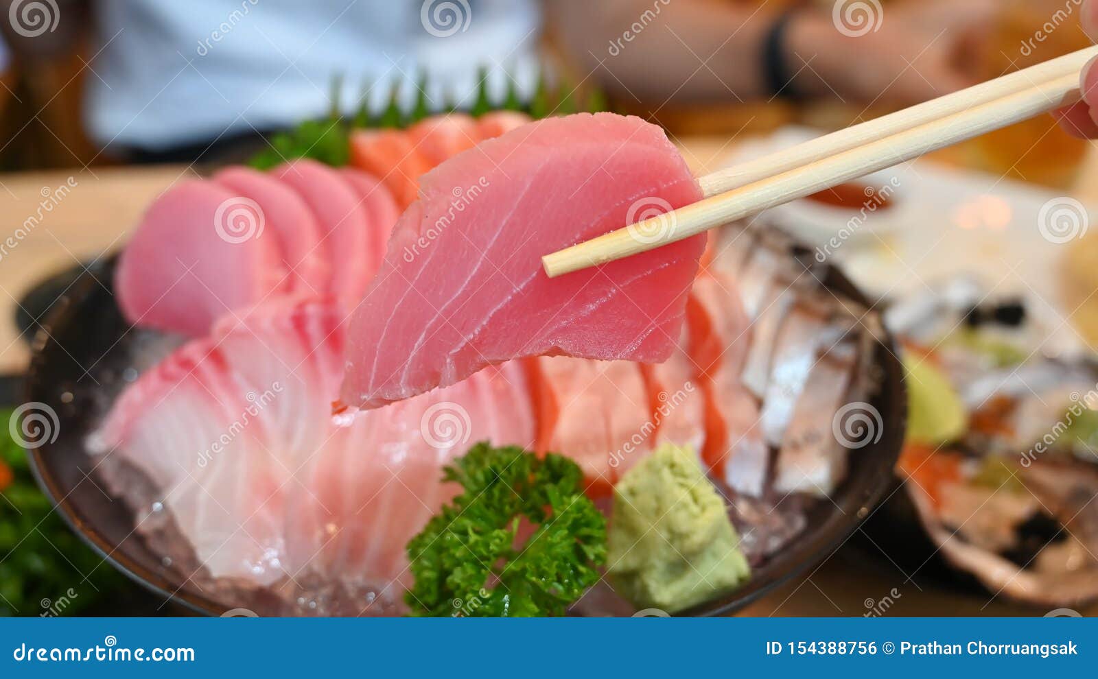Tuna Sashimi Slice on Chopsticks Stock Photo - Image of slice, fresh ...