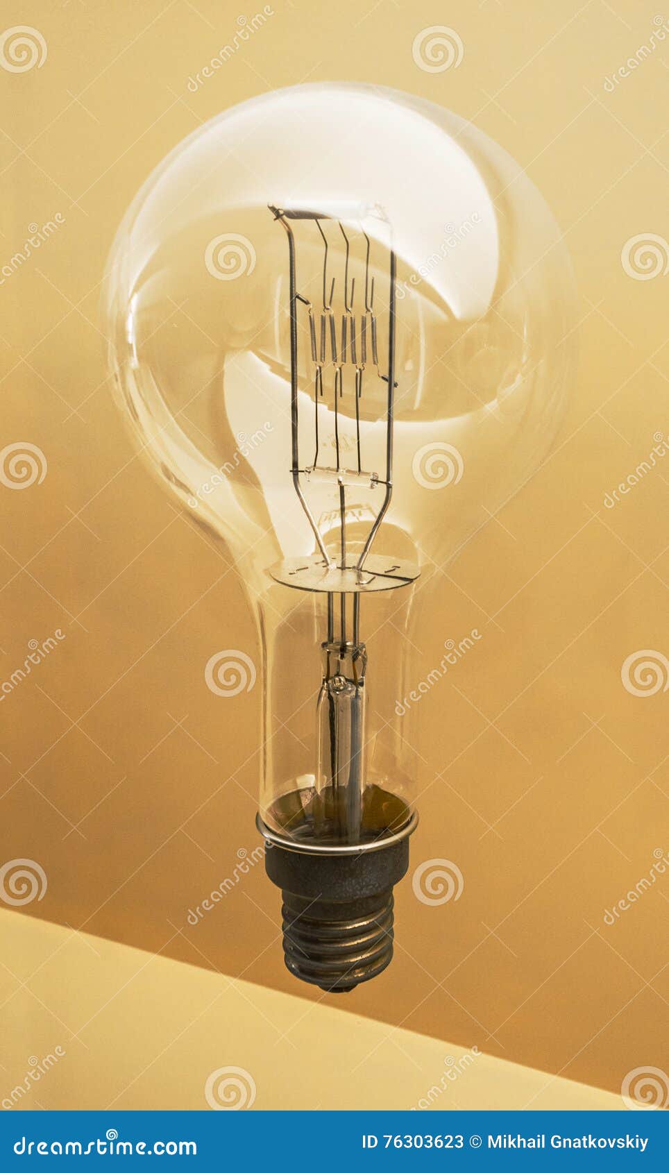 Tungsten large light bulb. stock image. Image of background - 76303623