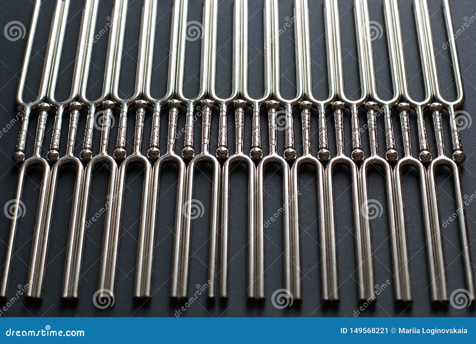 Tuning Fork Vertical Pattern on a Black Background, Side View Stock ...