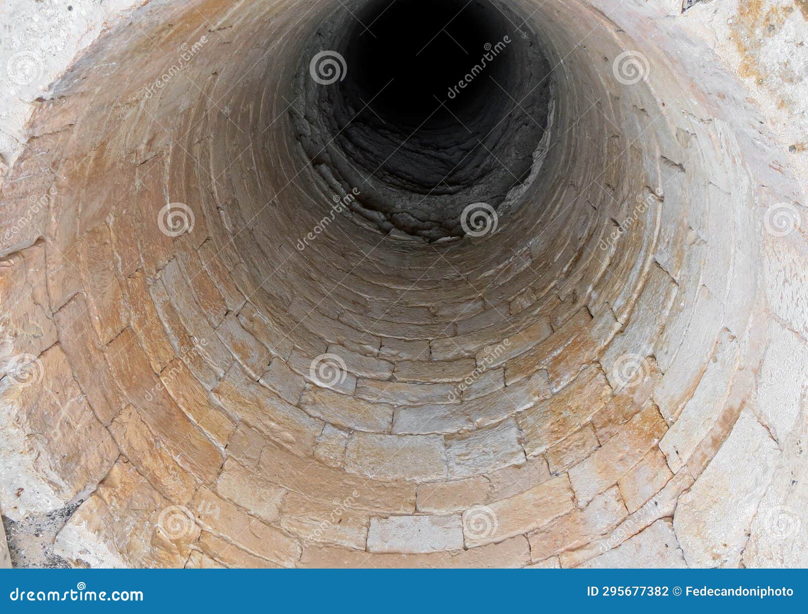 Tunnel or a Bottomless Pit Made of Rocks and Stones Stock Photo - Image ...