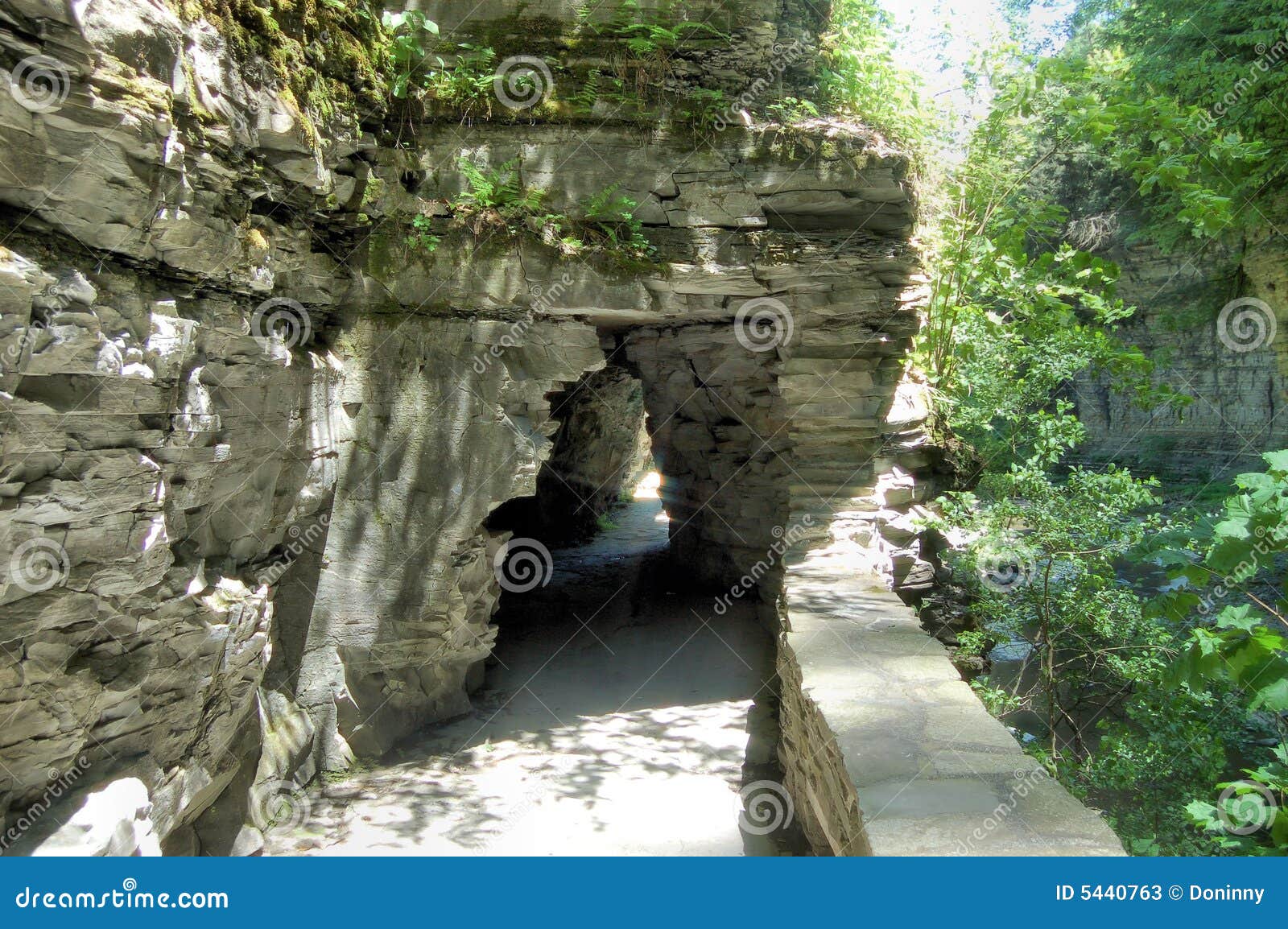 Tunnel through rock face stock image. Image of outdoor - 5440763