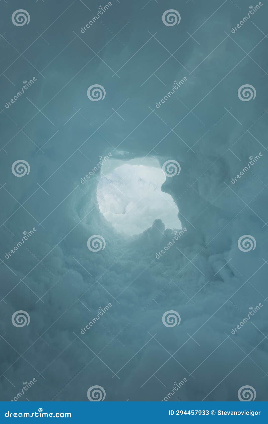 Tunnel in the Snow with Hole Opening To the Light Exit Stock Image ...