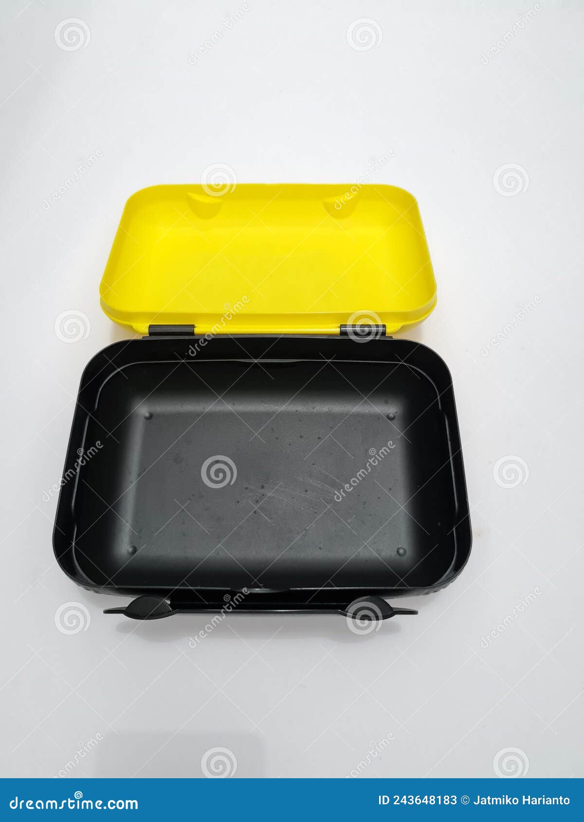 Tupperware Black and Yellow Combination Lunch Box Made of Plastic Stock ...